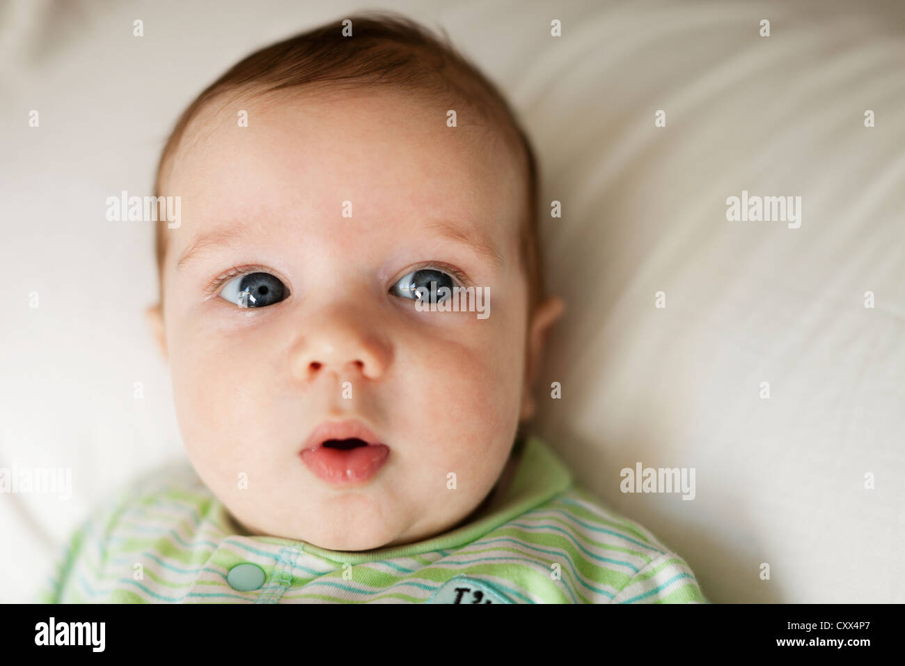 Curious Caucasian baby boy Stock Photo - Alamy