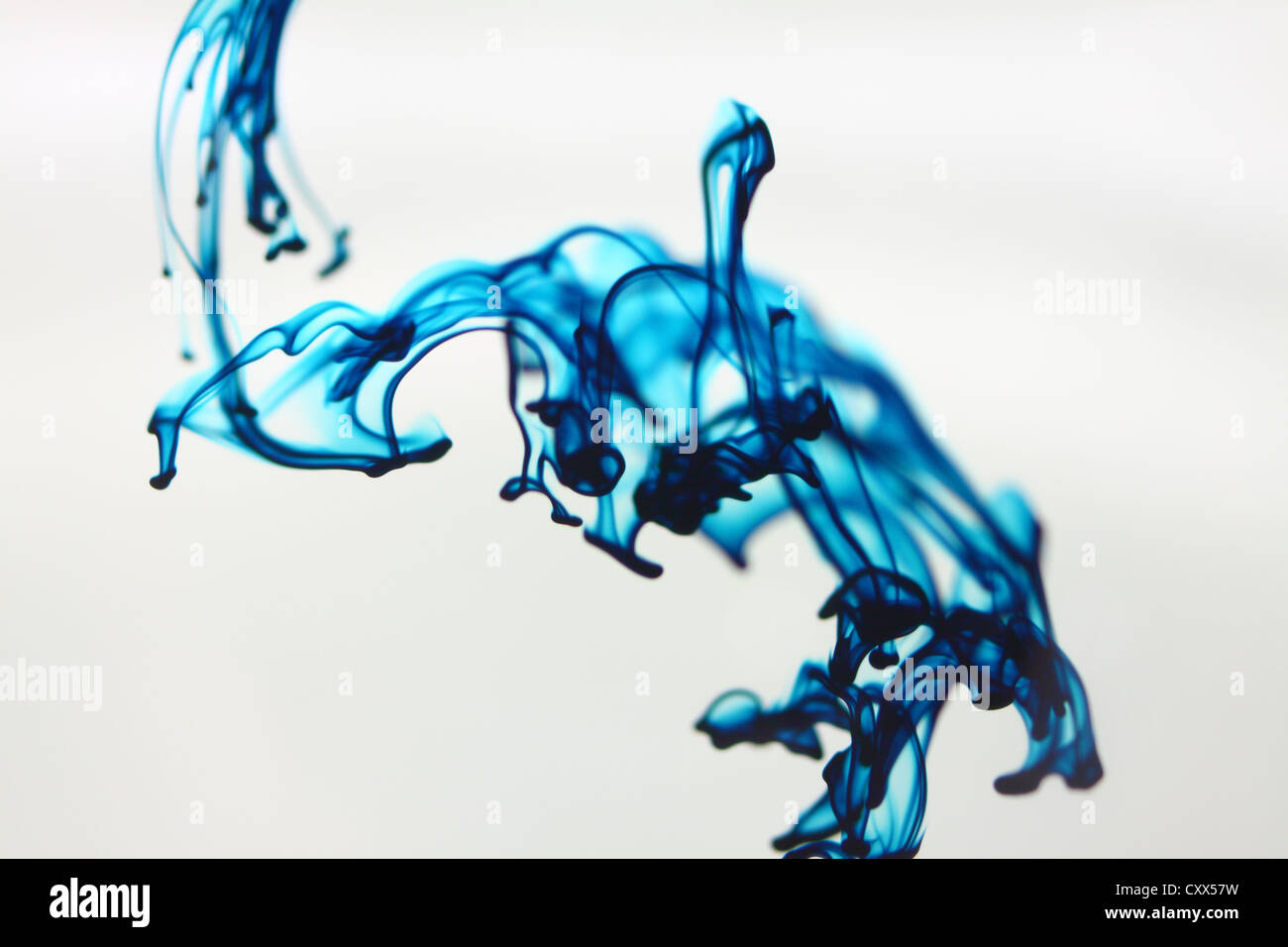 Blue dye in water Stock Photo - Alamy