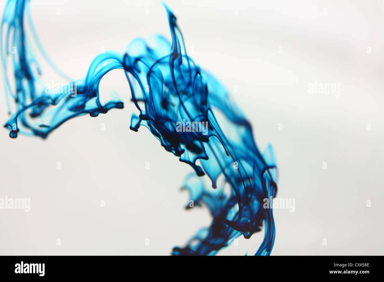 Blue dye in water Stock Photo - Alamy