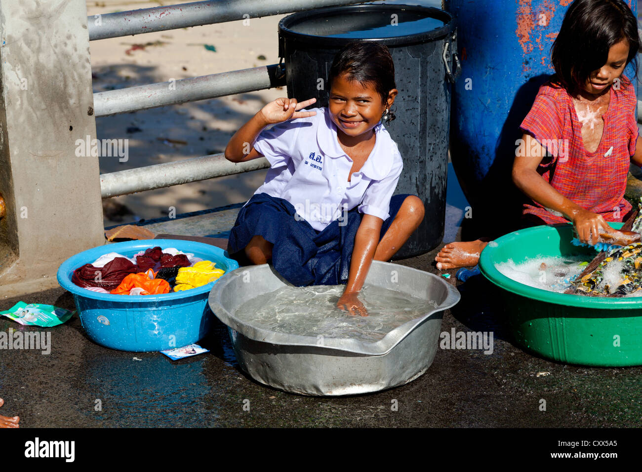 Little Sea Gypsy Children doing the Laundry at Rawai Beach in Phuket ...