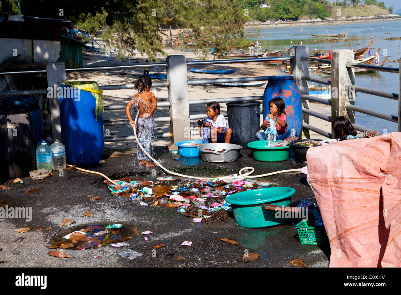 Little Sea Gypsy Children doing the Laundry at Rawai Beach in Phuket ...