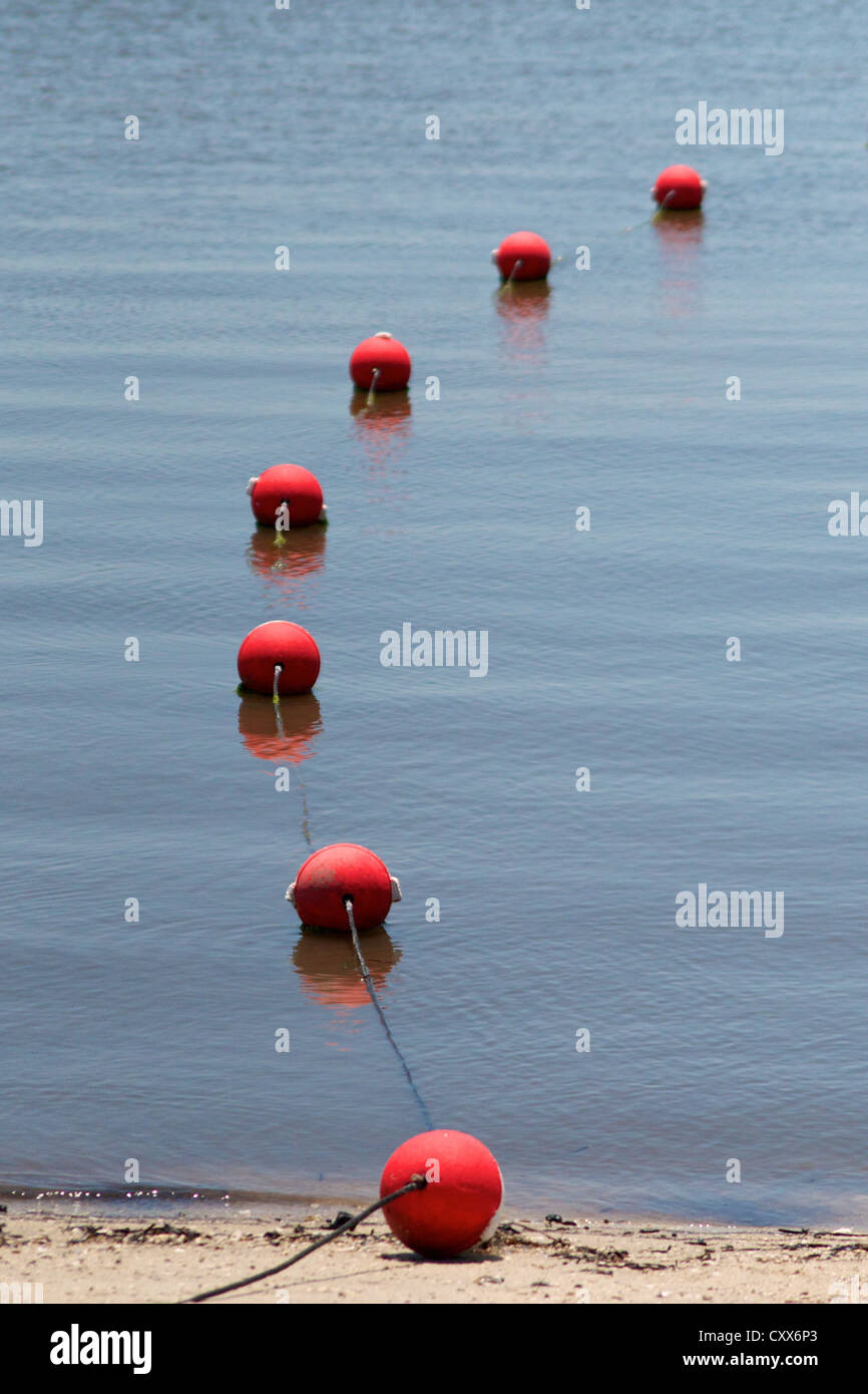 Line of buoys in Cedar Key Stock Photo - Alamy
