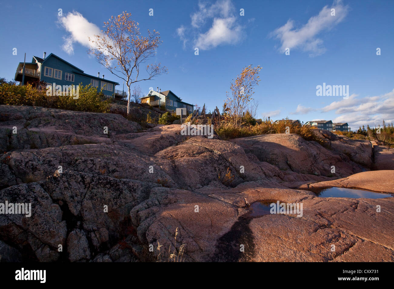 Sun sets on Condos Natakam buildings in the Essipit Innu community in ...
