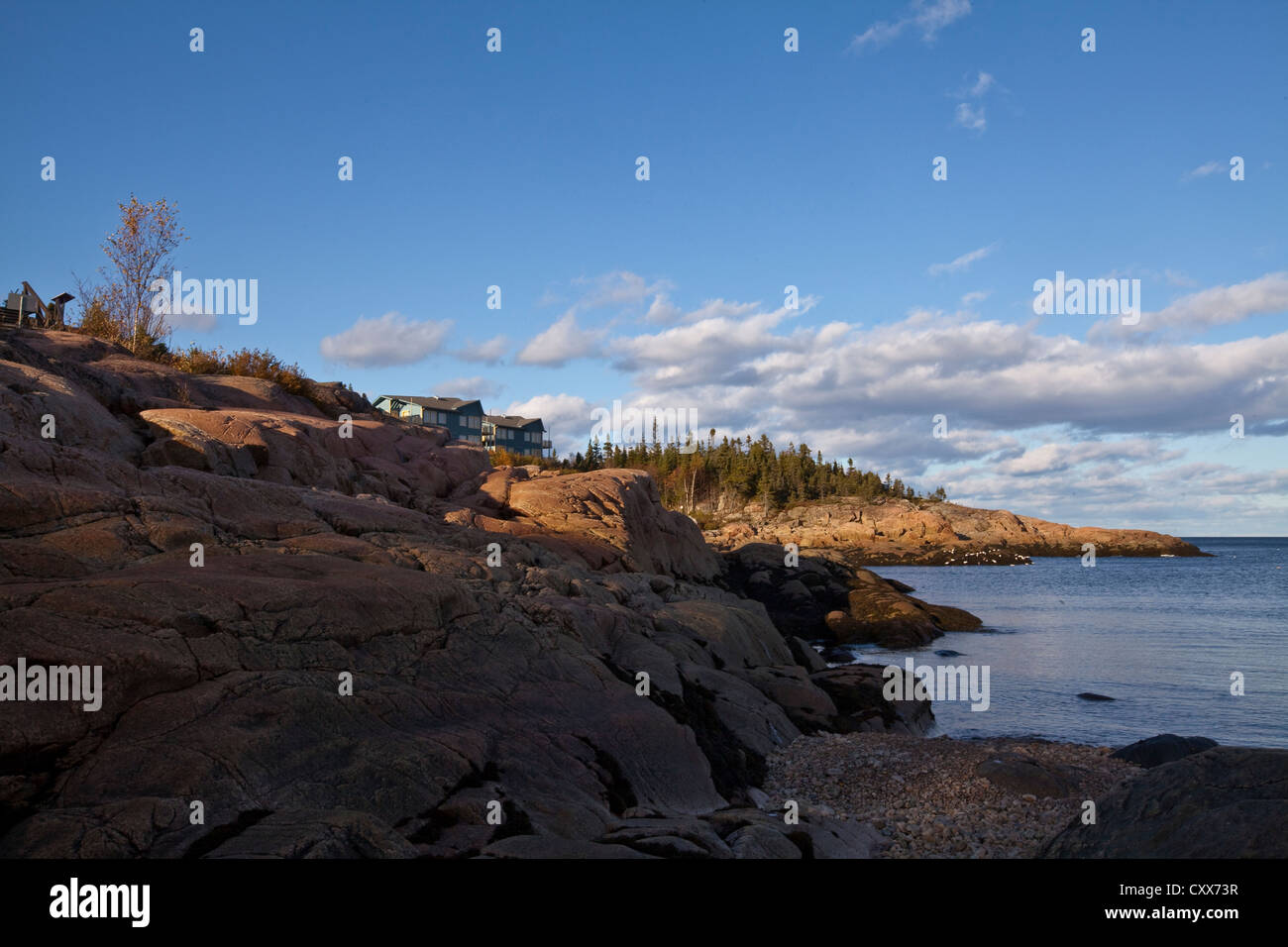 Sun sets on Condos Natakam buildings in the Essipit Innu community in ...