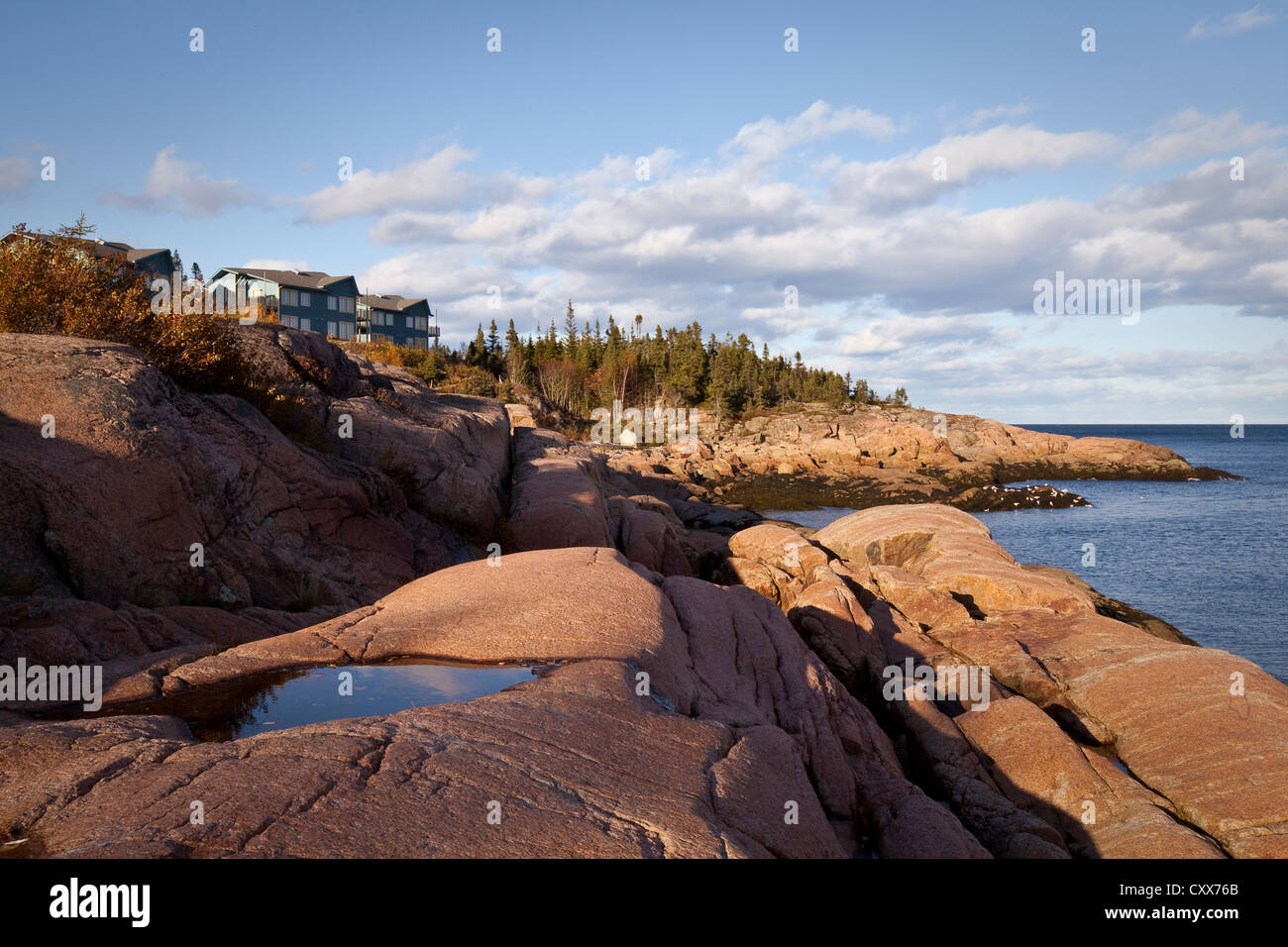 Sun sets on Condos Natakam buildings in the Essipit Innu community in ...