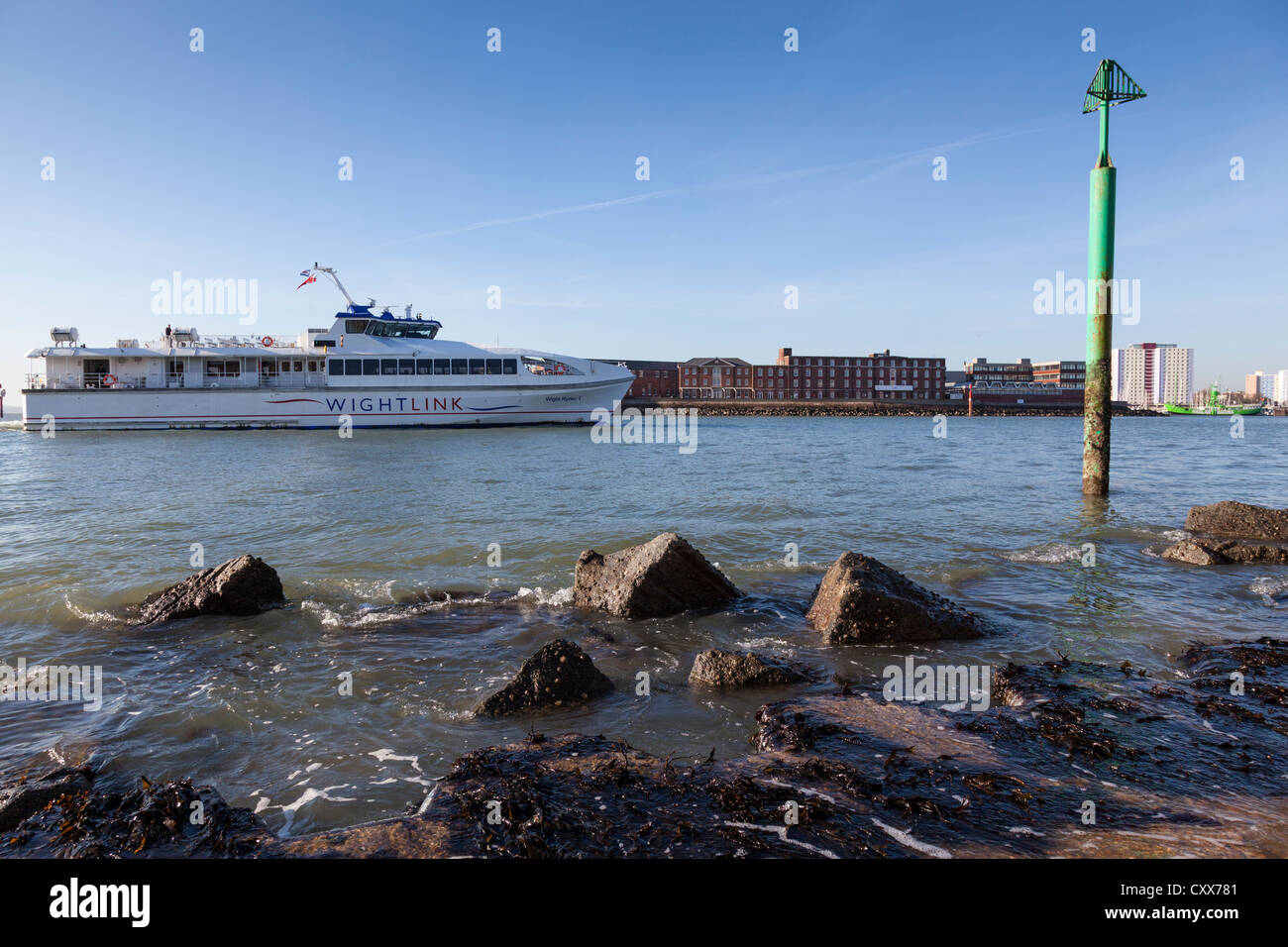 A Wightlink catamaran ferry makes its way into Portsmouth harbour with ...