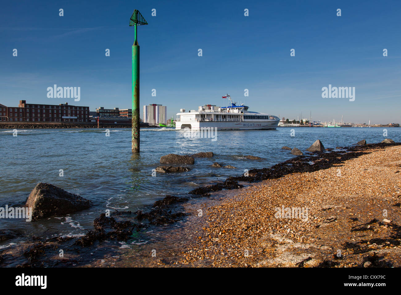 A Wightlink catamaran ferry makes its way into Portsmouth harbour with ...