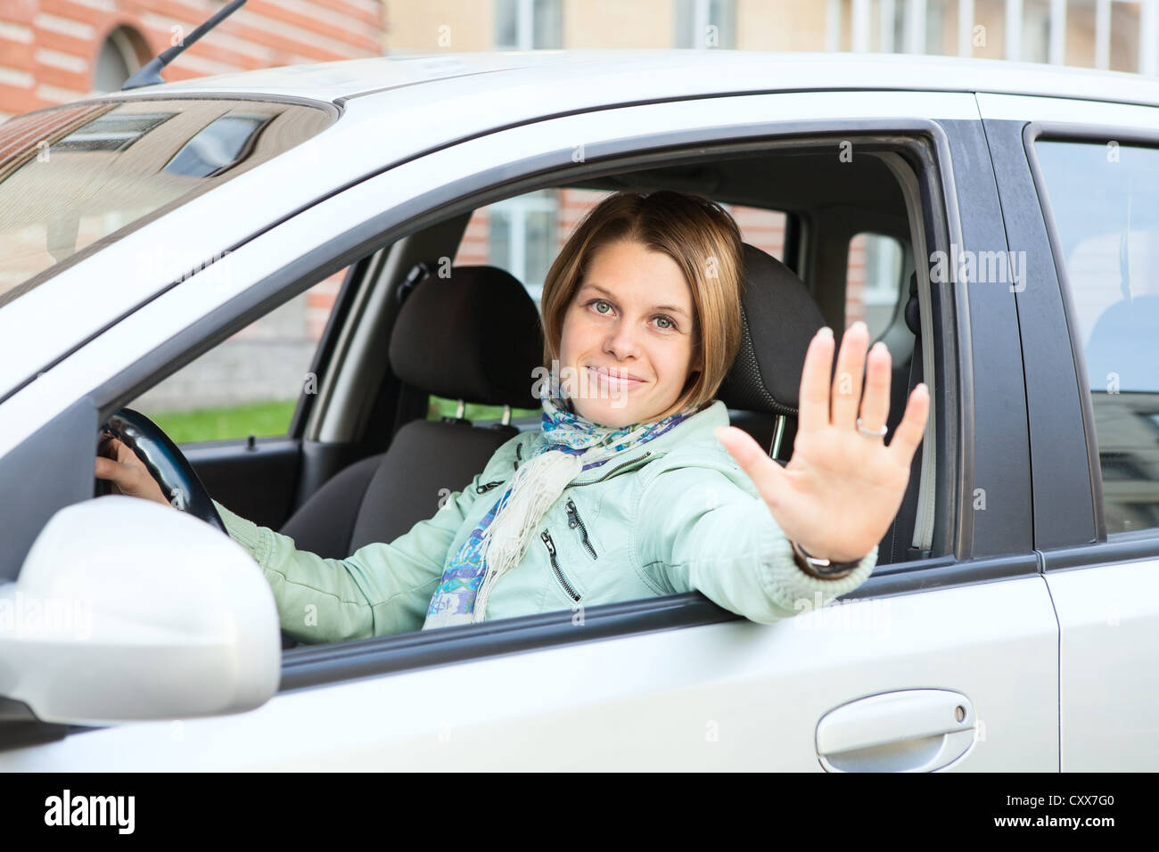 Wave hand car window hi-res stock photography and images - Alamy