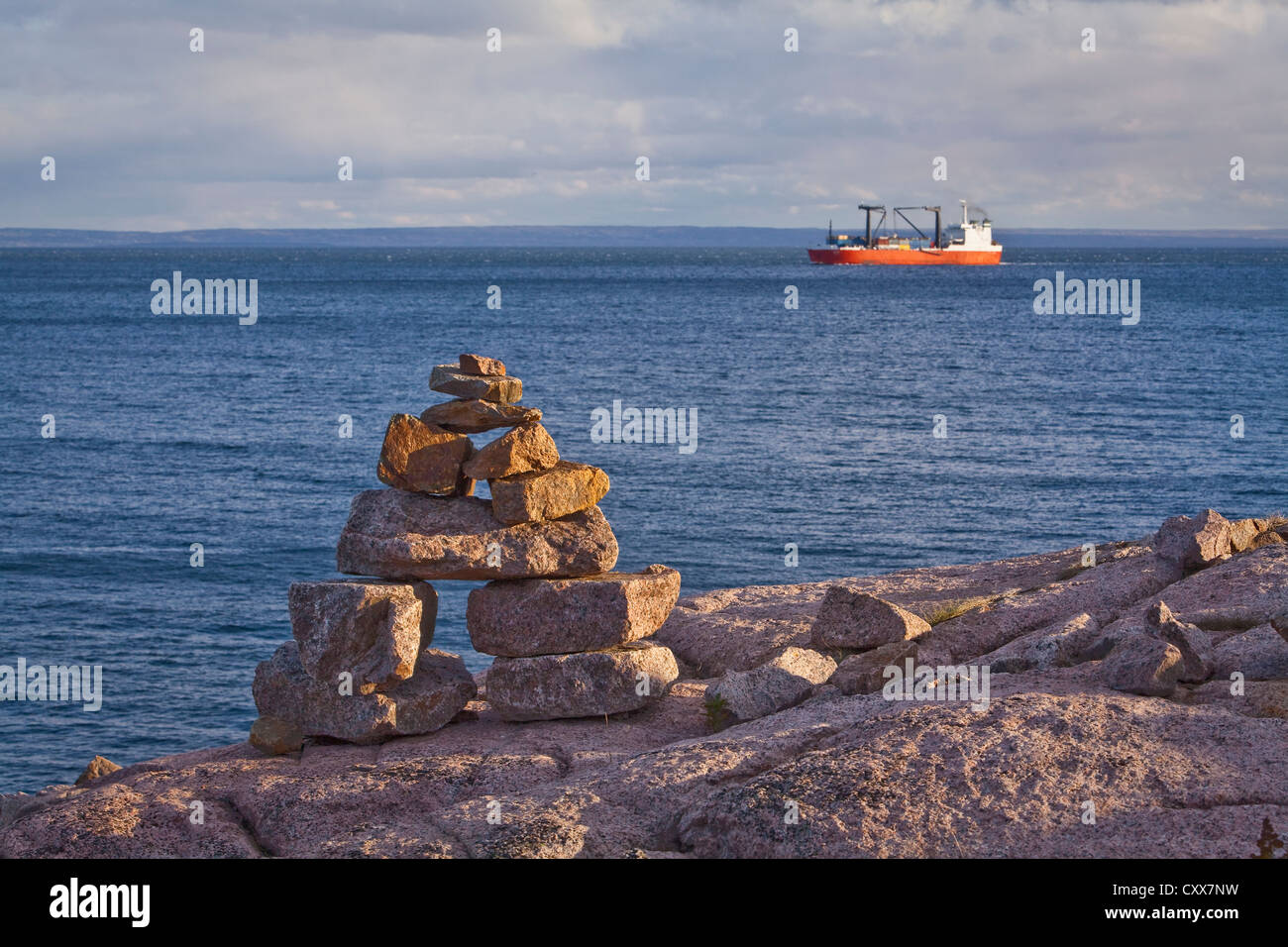 Sun sets on inuksuit (plural form of inuksuk) in front of the St ...