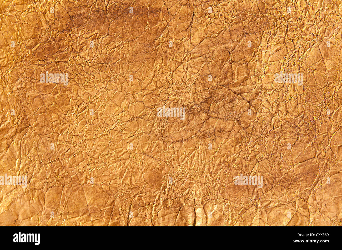 Gold old paper useful for background Stock Photo - Alamy