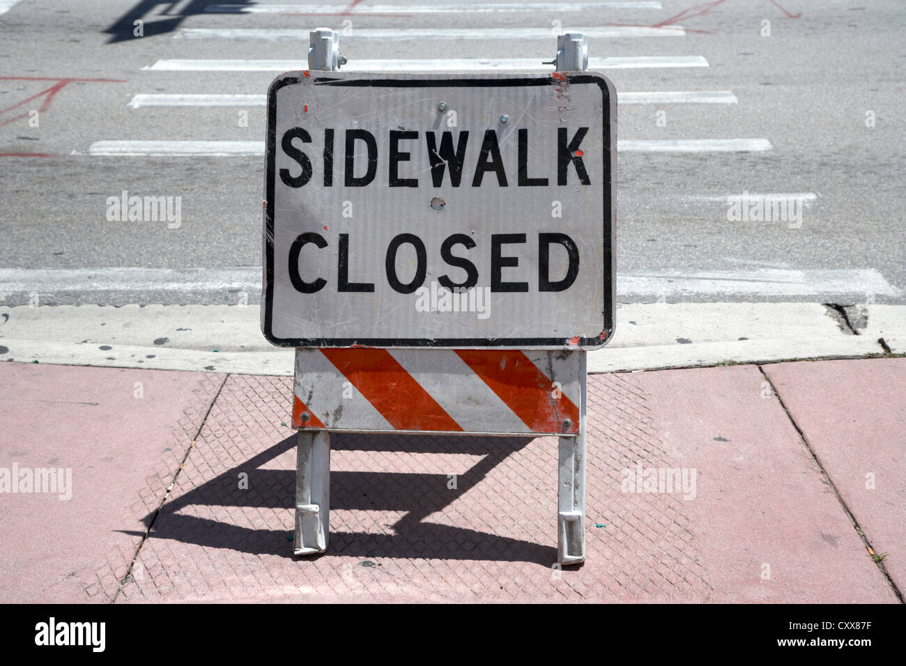 sidewalk closed sign at road pedestrian crossing miami south beach ...
