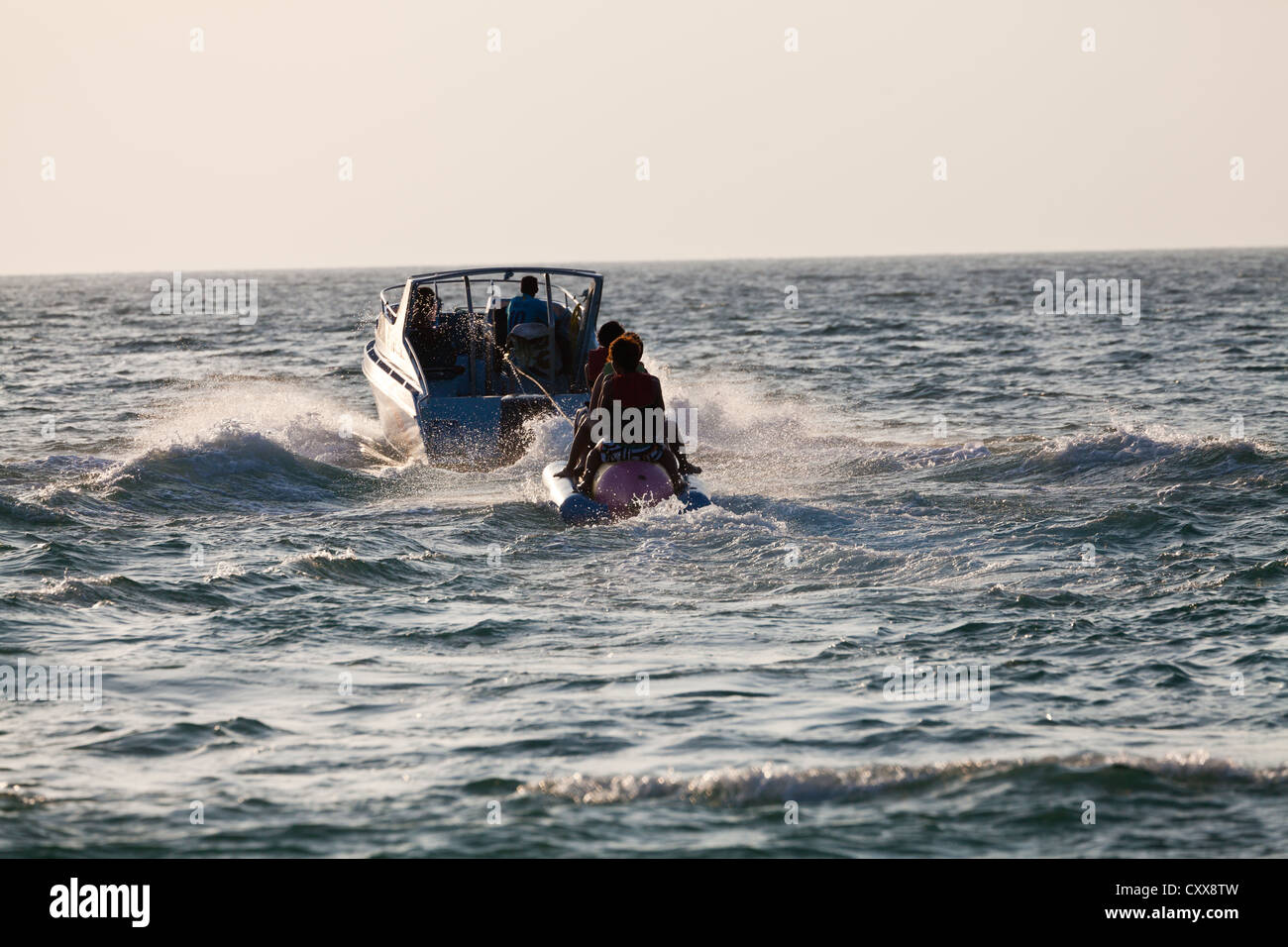 Moto Boat pulling Banana on Patong Beach on Phuket, Thailand Stock ...
