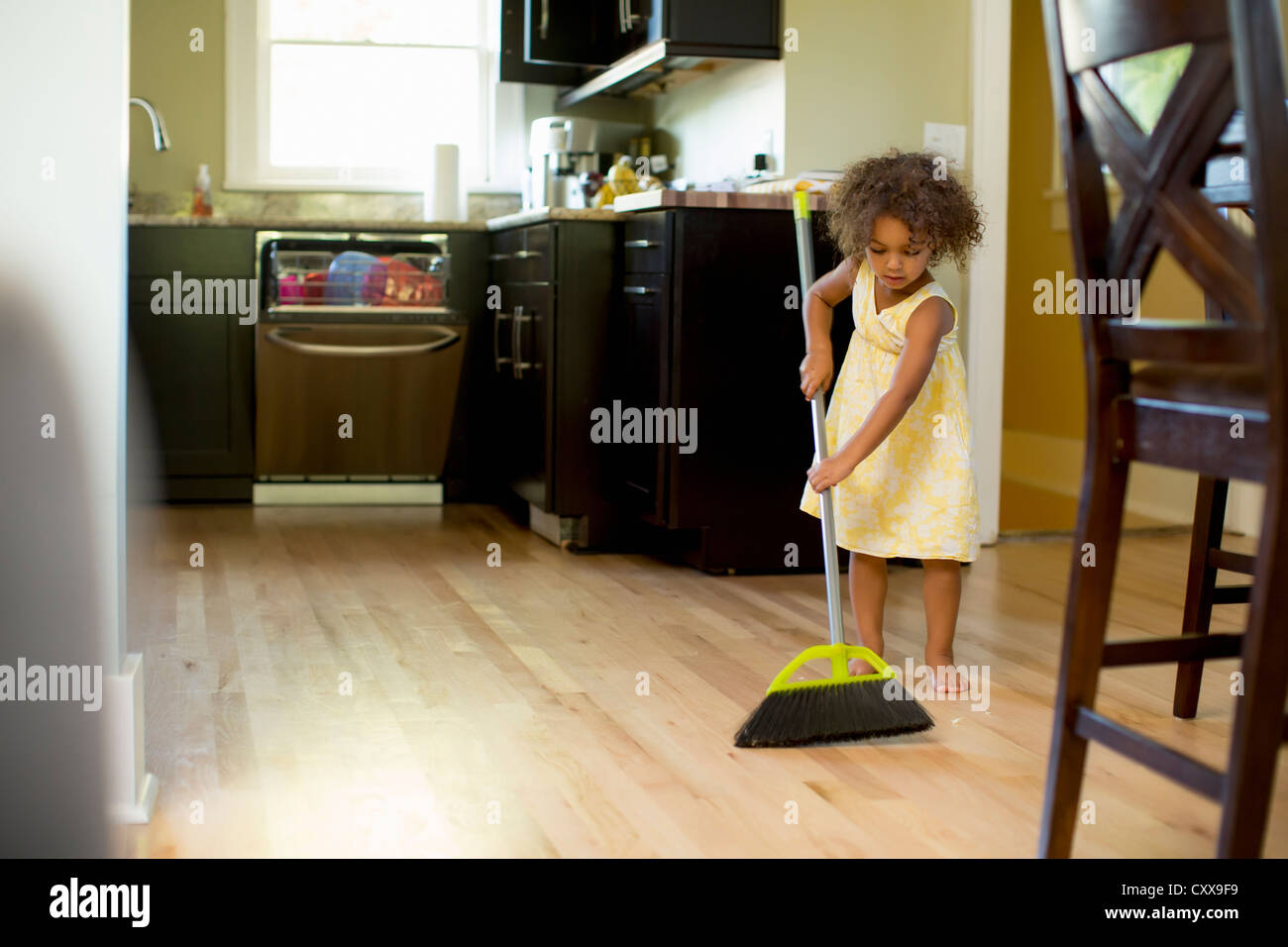 Girl sweeping hi-res stock photography and images - Alamy