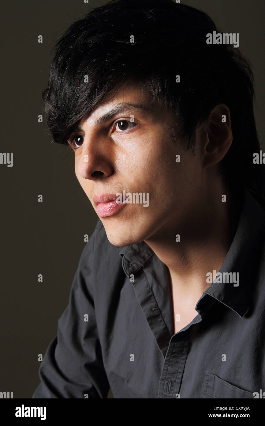 Moody dark close-up portrait of young good looking male model Stock ...