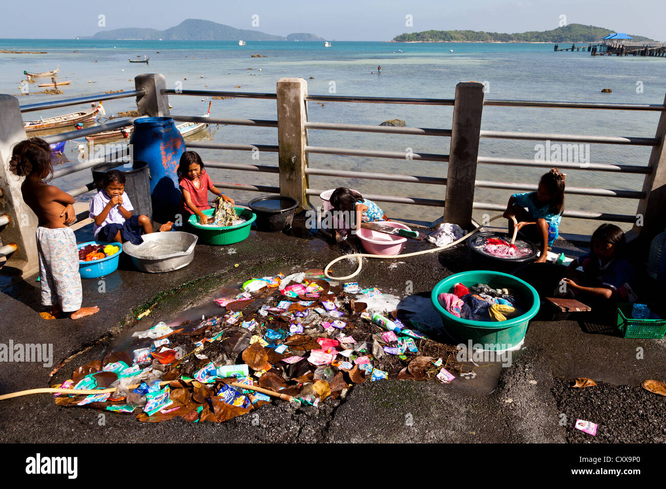Little Sea Gypsy Girls doing the Laundry on Rawai Beach on Phuket Stock ...