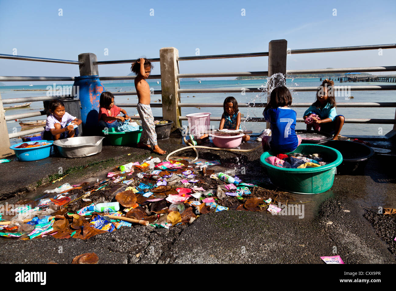 Little Sea Gypsy Girls doing the Laundry on Rawai Beach on Phuket Stock ...