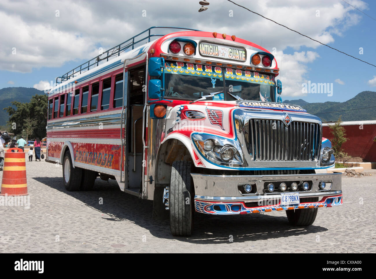 Brightly decorated local buses (chicken buses) at Antigua city bus ...