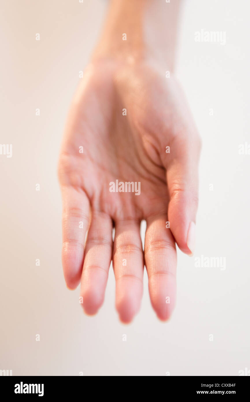Cape Verdean woman with hand outstretched Stock Photo - Alamy