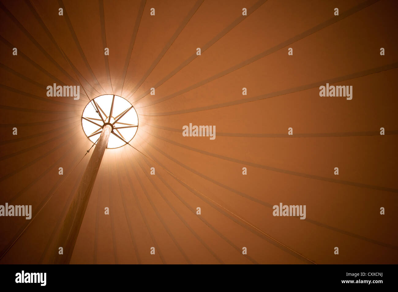 Canopy installed on a single tall pole with silhouetted lines Stock ...