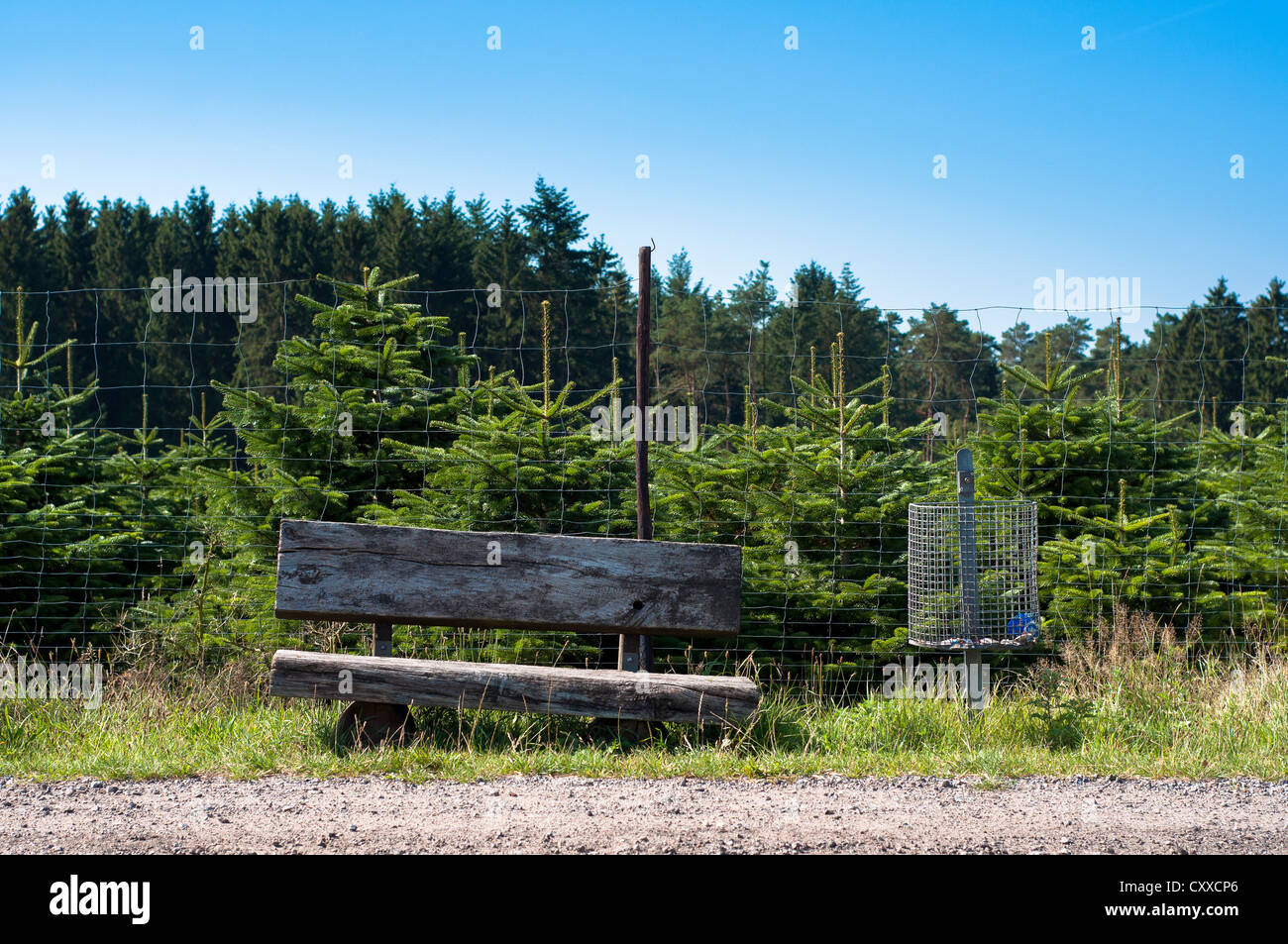 A lonely bench on a barren road Stock Photo - Alamy