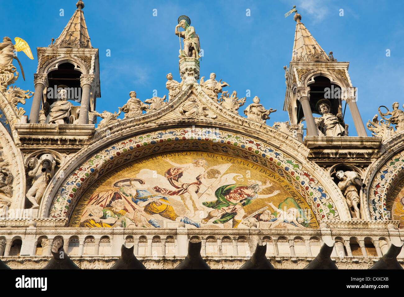 Mosaic scene amongst the ornate architectural details on the basilica ...