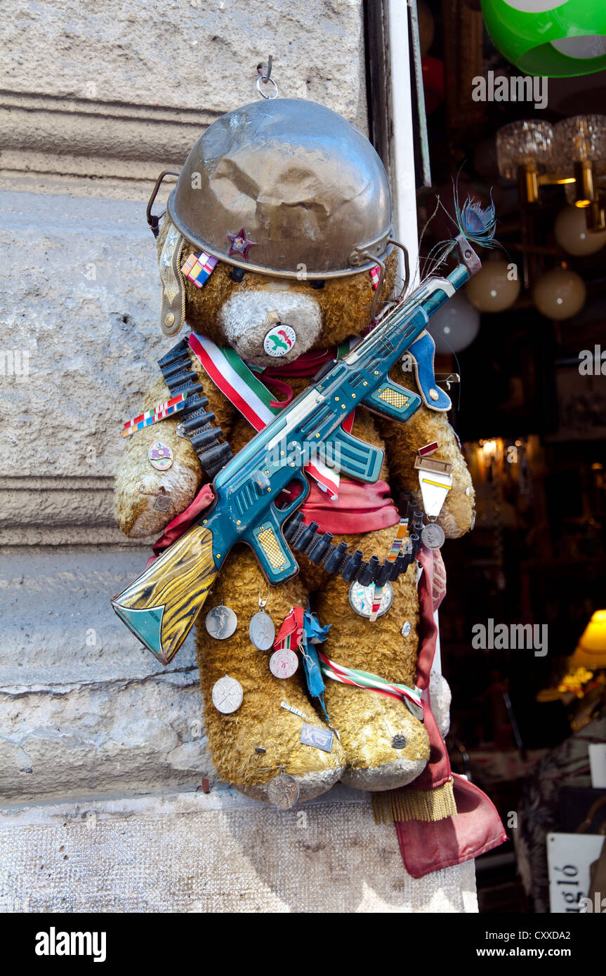 Funny teddy bear toy with weapon Stock Photo - Alamy