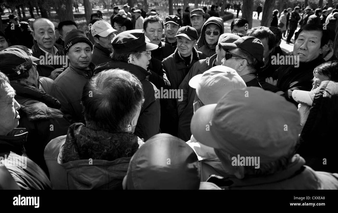 Jingshan Park, Beijing. Political debate in the park between the ...