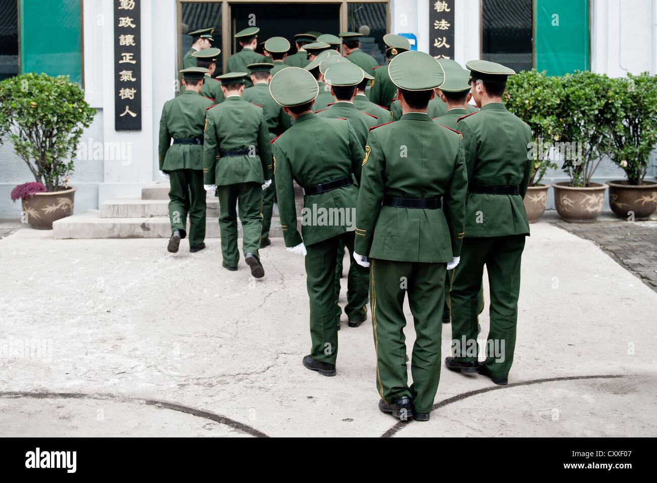 Pingyao, Shanxi, China. Security guards Stock Photo - Alamy