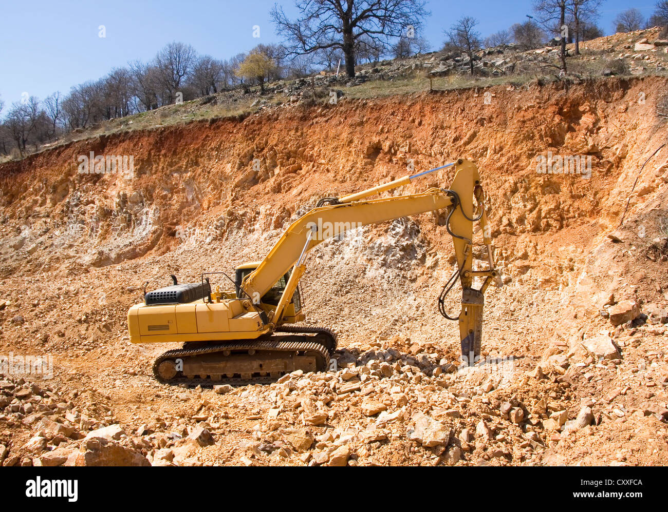 Heavy duty construction equipment by work site Stock Photo - Alamy
