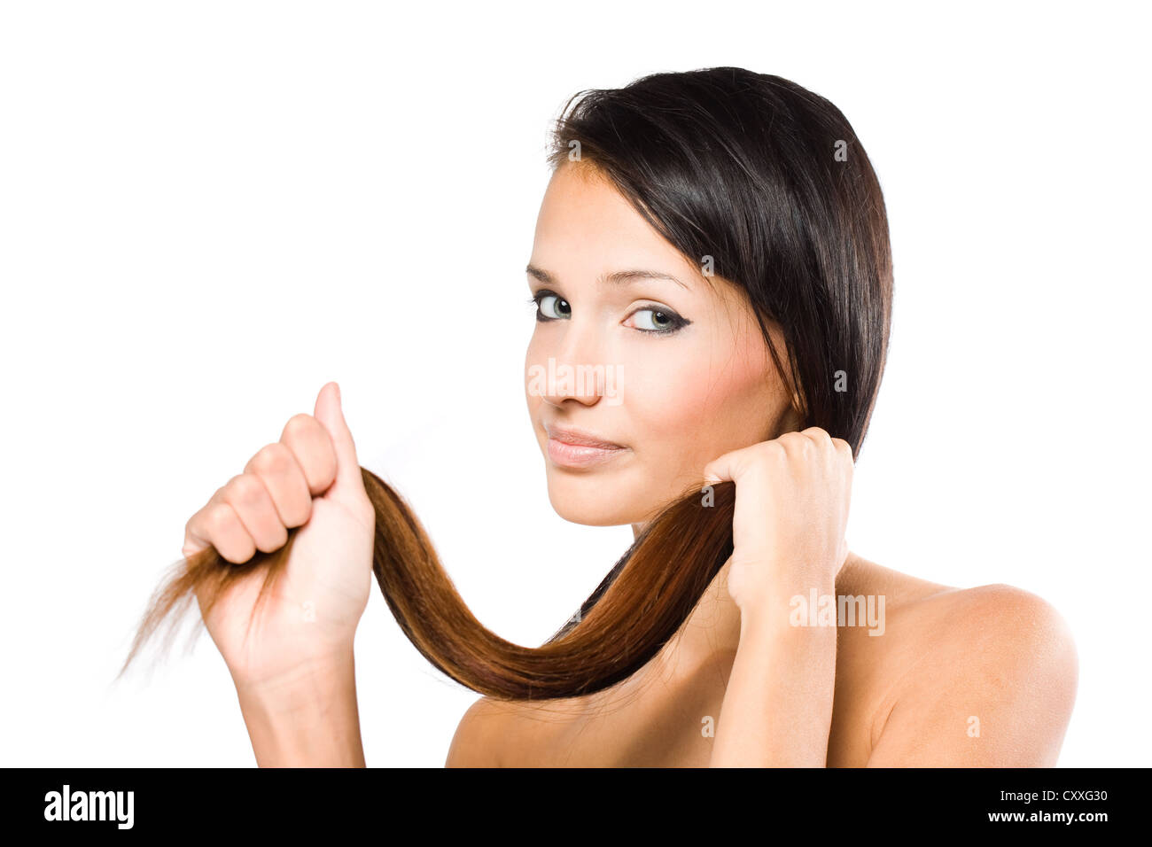 The hair check, portrait of a beautiful young brunette woman with shiny ...