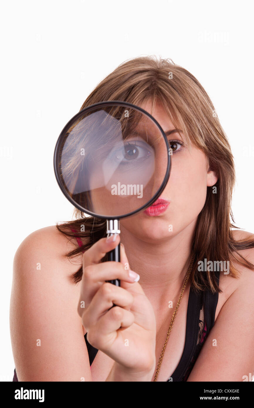 Woman examines magnifying glass hi-res stock photography and images - Alamy