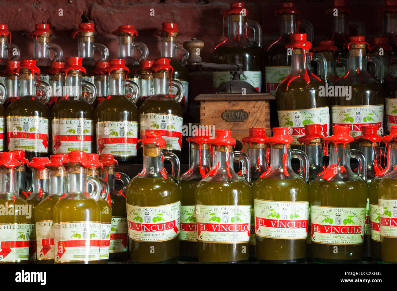 Olive oil factory, shelf with products, Zahara de la Sierra, Andalusia ...