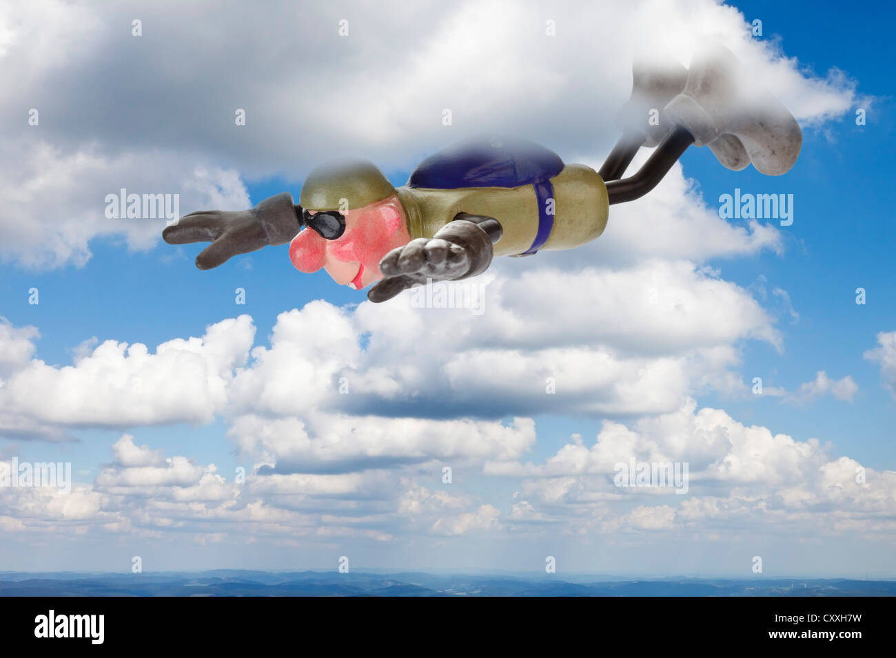 Cartoon character, basejumper in gliding flight through clouds Stock ...