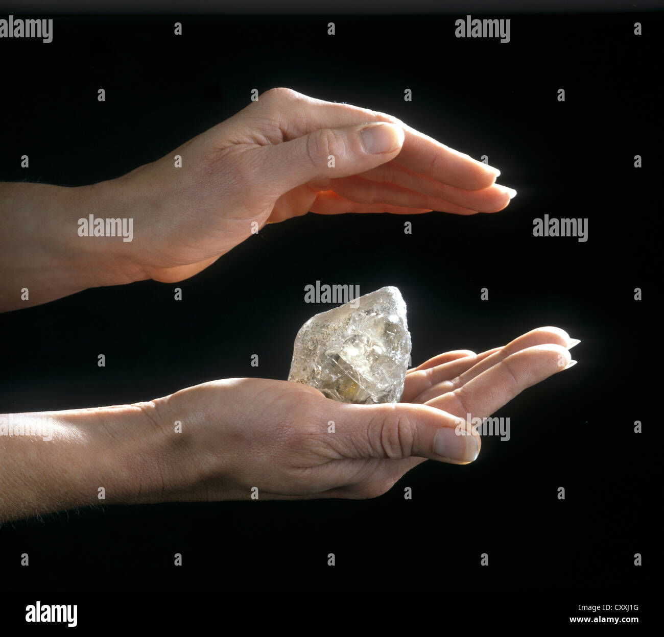 Hand holding gemstones hi-res stock photography and images - Alamy