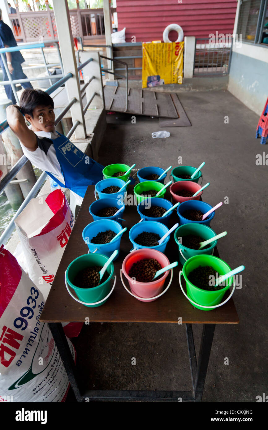Colorful Buckets on a Table in Bangkok, Thailand Stock Photo - Alamy