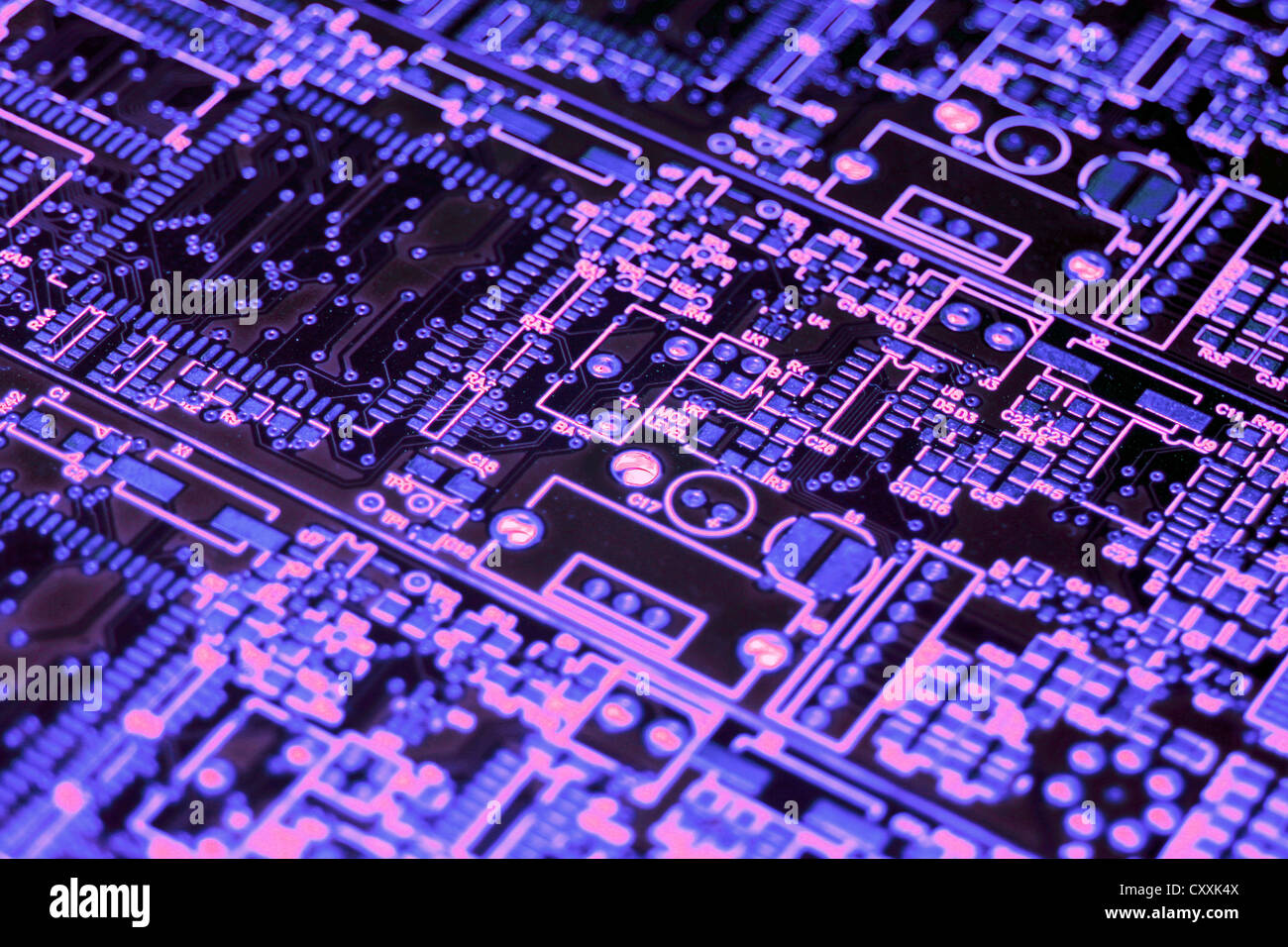 detail of electronic circuit board, purple and pink Stock Photo - Alamy