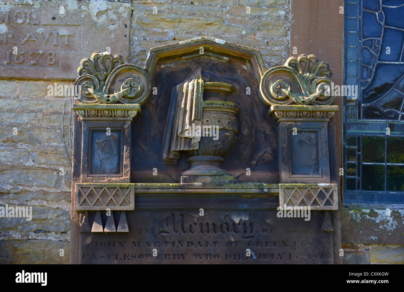 Gravestone with draped urn design. All Saints Church, Raughton Head ...