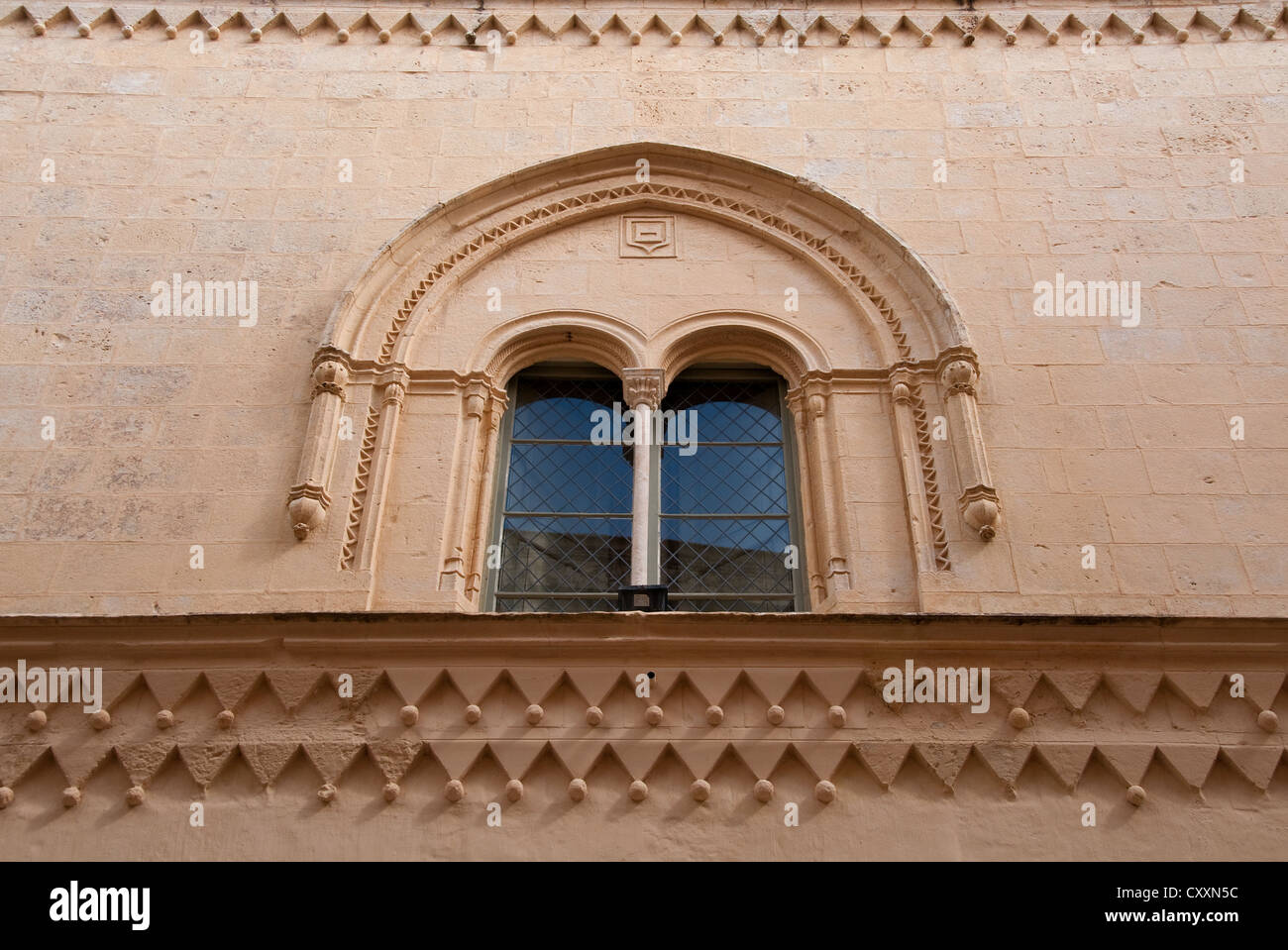 The 1495 "Norman Window" on the Villa Falzon, Mdina, Malta Stock Photo ...