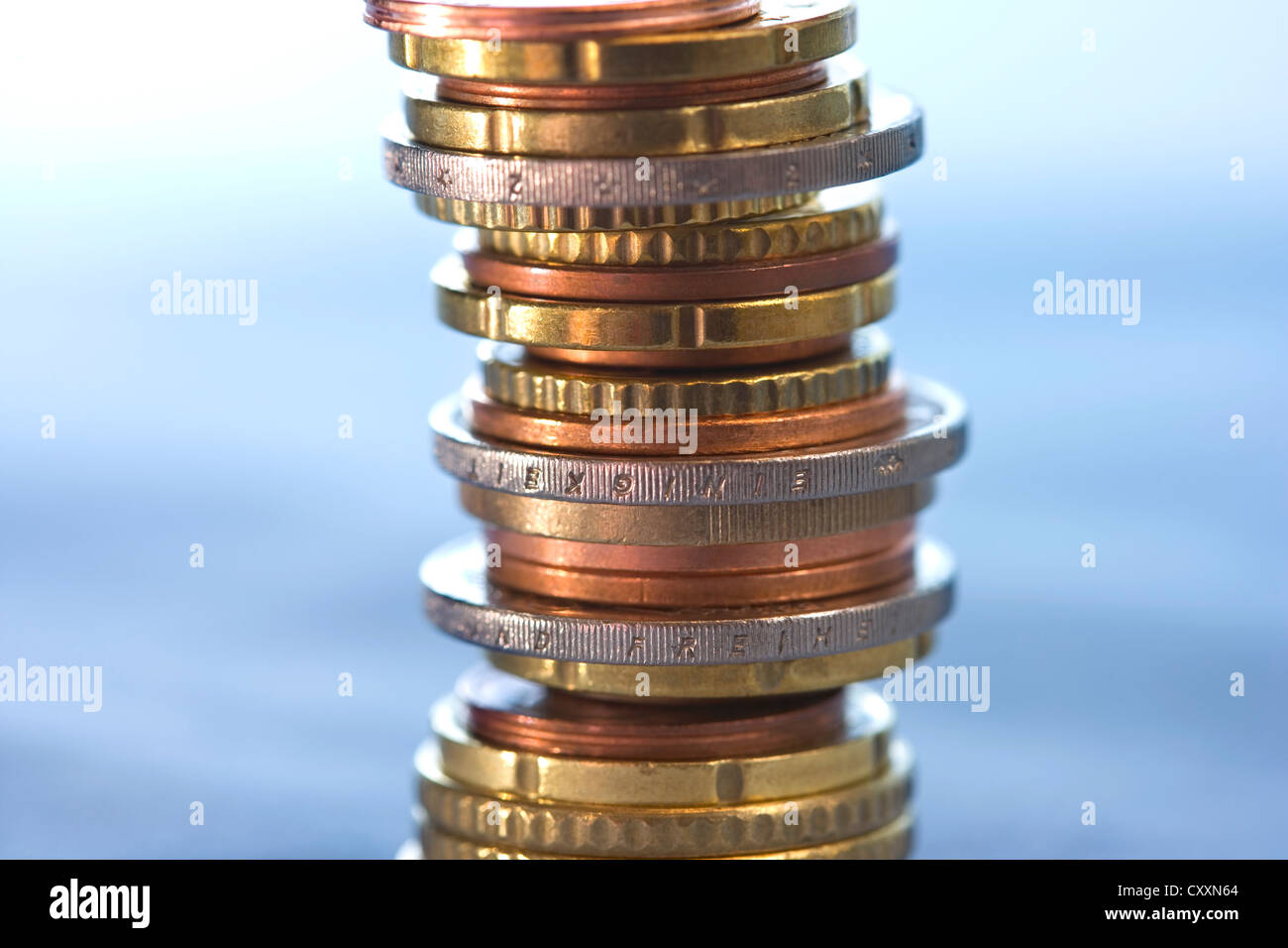 Stack of coins, euro coins Stock Photo - Alamy