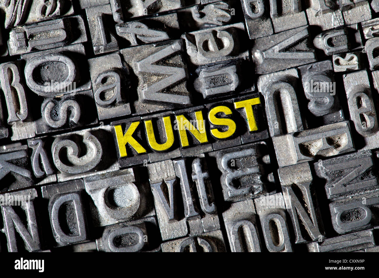Old lead letters, lettering "KUNST", German for "art Stock Photo - Alamy
