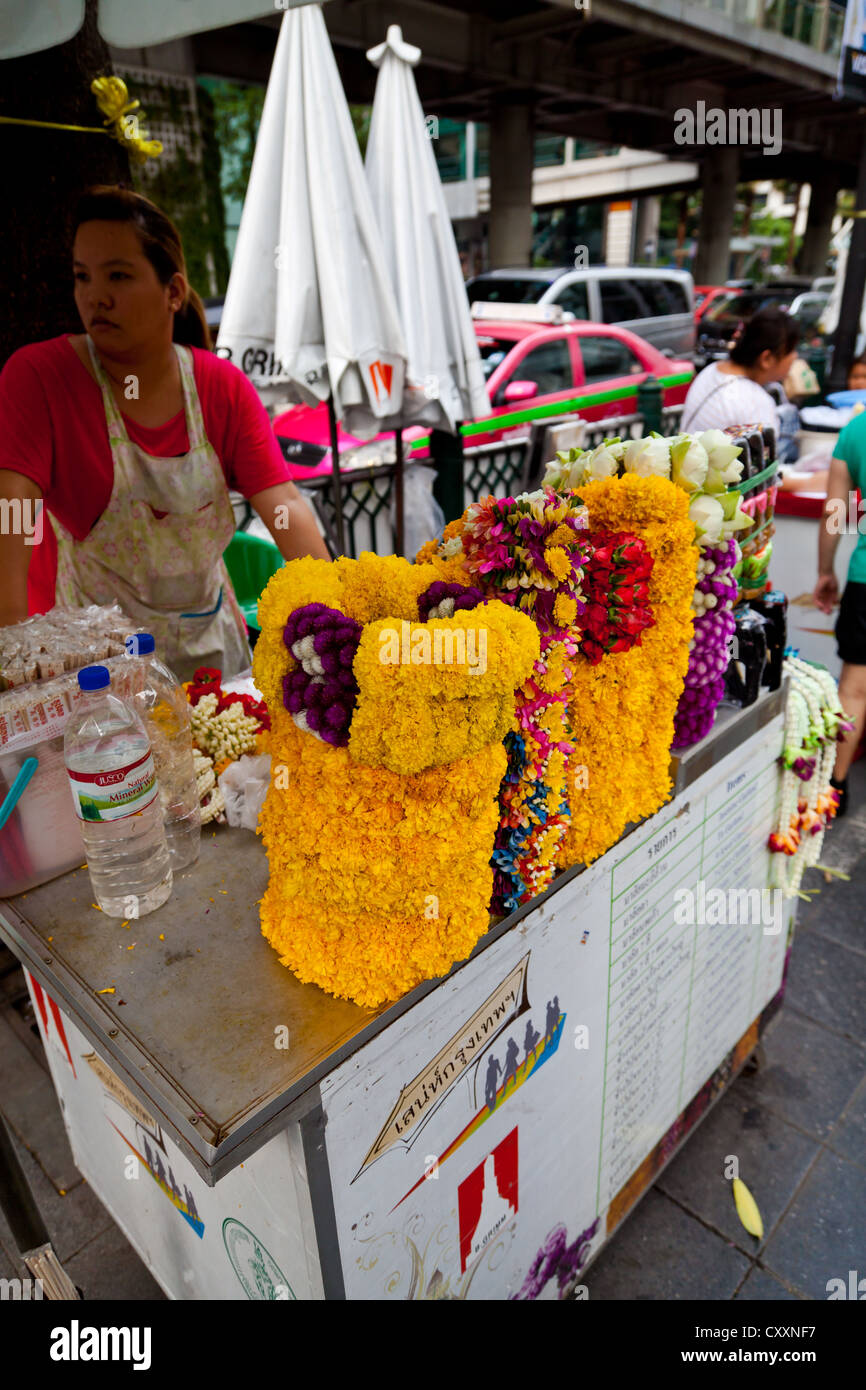 Sale of Temple Flowers at the Erawan Shrine in Bangkok, Thailand Stock ...
