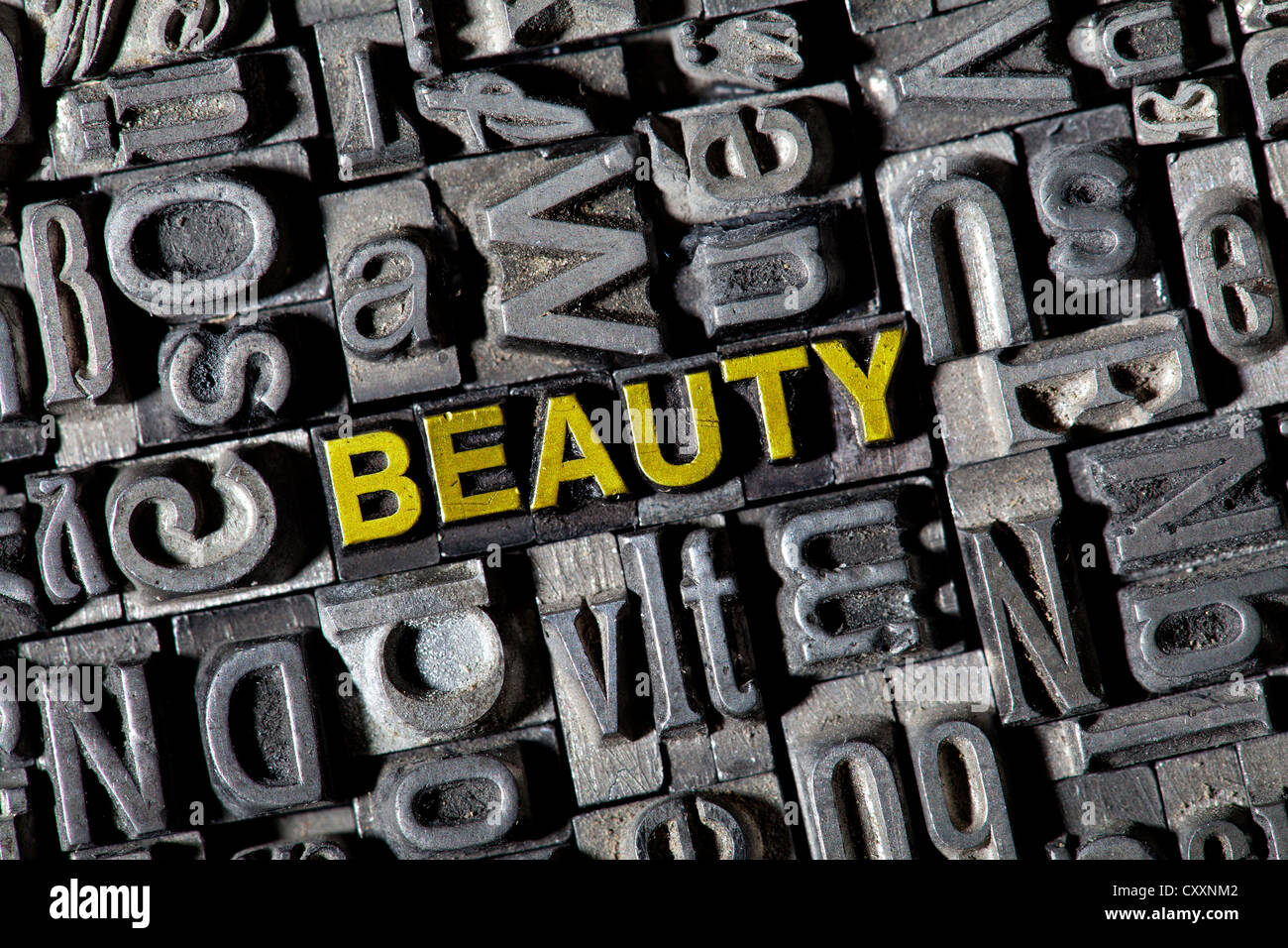 Old lead letters, lettering "BEAUTY Stock Photo - Alamy