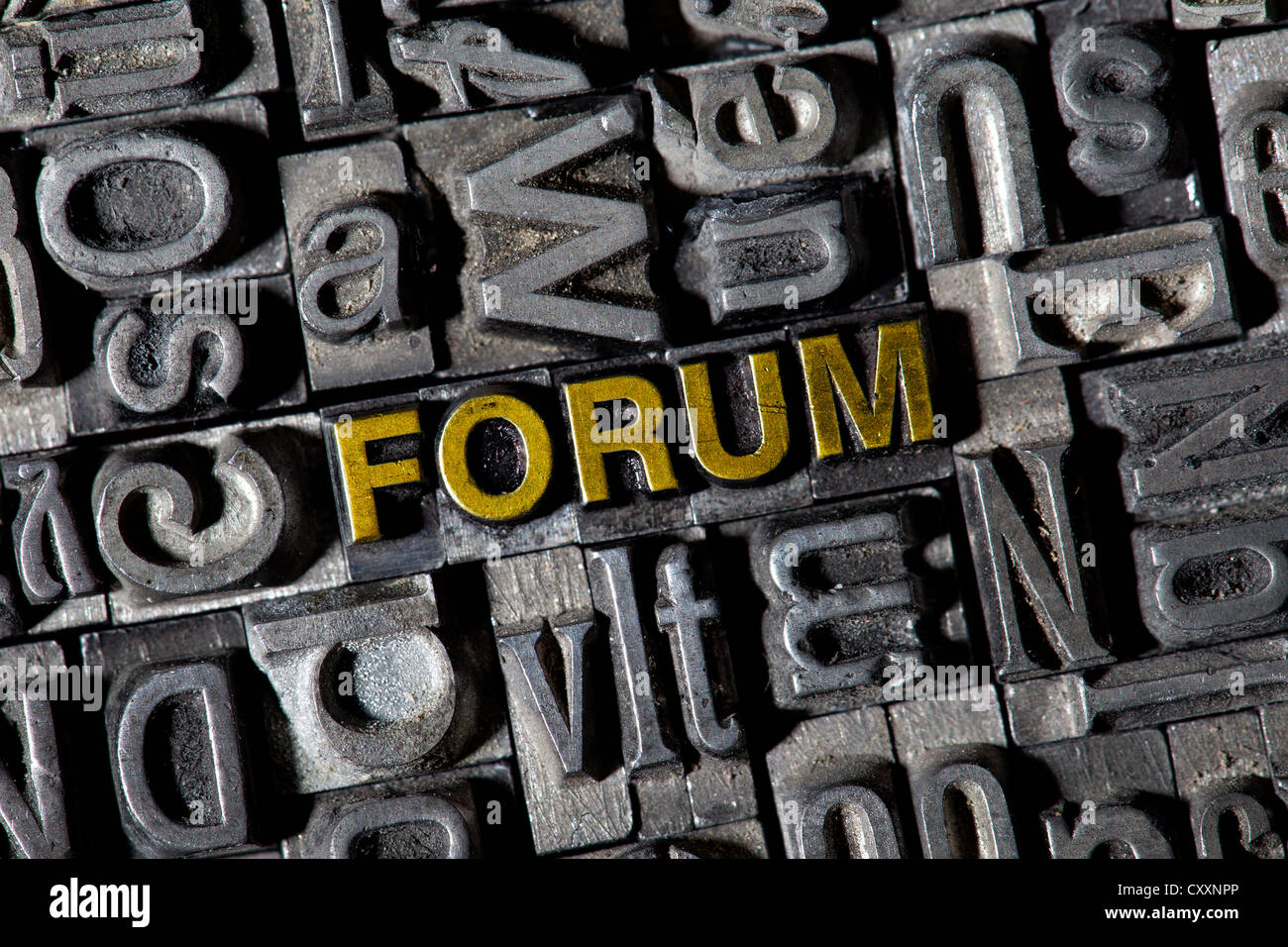 Old lead letters forming the word "FORUM Stock Photo - Alamy