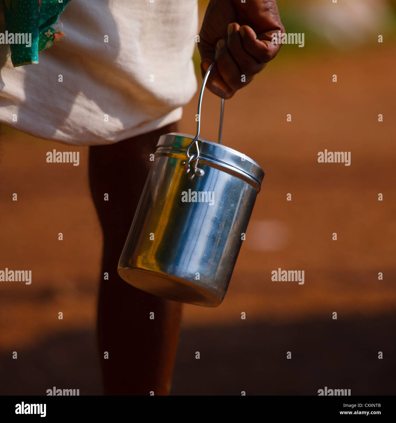 Man Carrying His Bucket Of Milk, Alleppey, India Stock Photo - Alamy