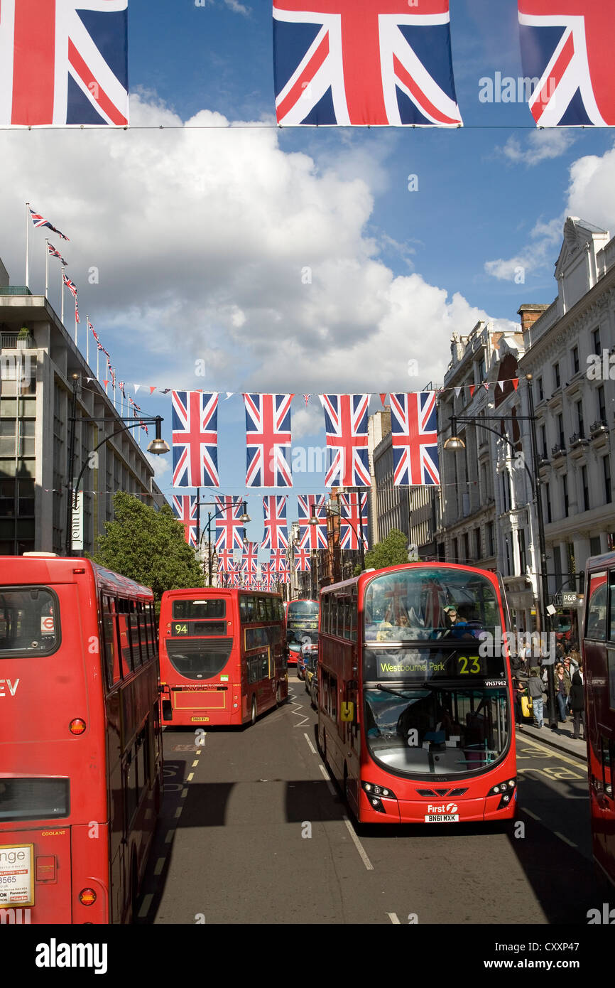 Traffic on Oxford Street, double-decker buses, Union Jack, national ...