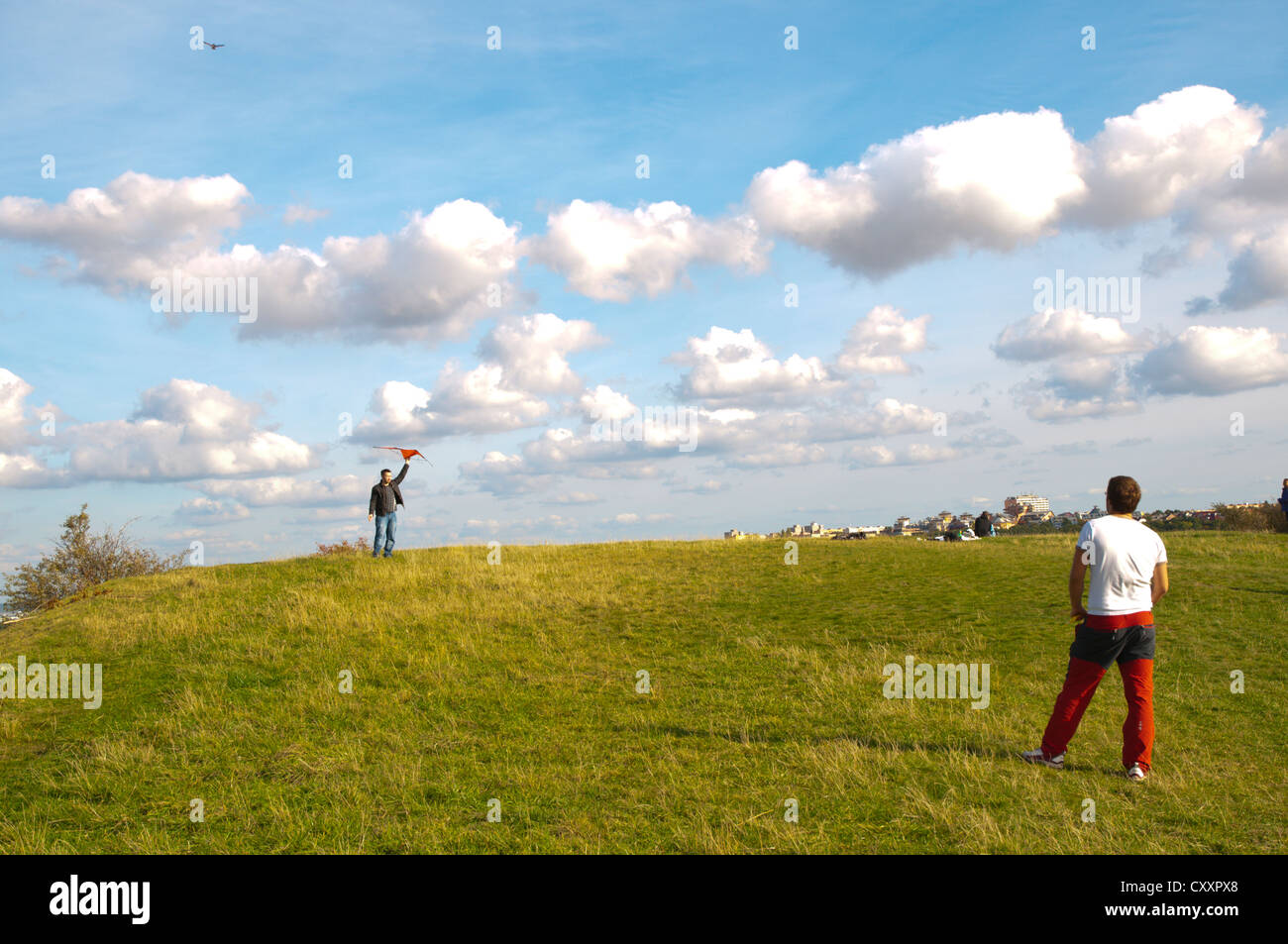 Men flying a kite Divoká Šárka the Sarka valley Liboc district Prague ...
