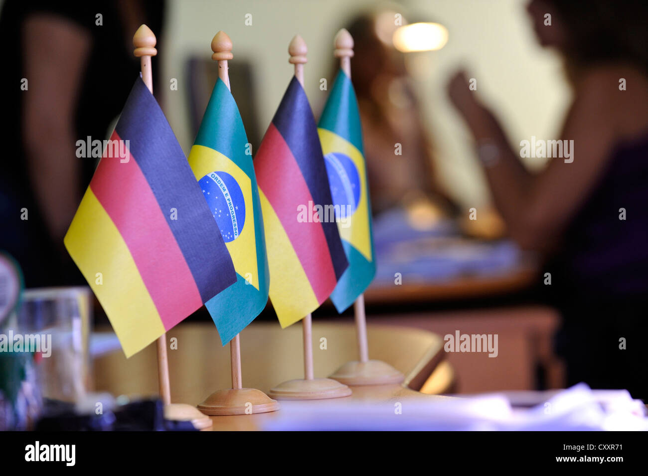 German and Brazilian national flags in an office as a symbol of ...