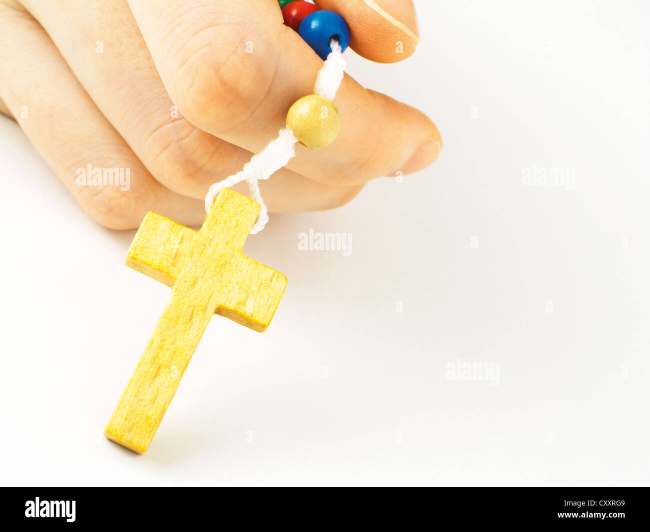 Hand holding a cross hi-res stock photography and images - Alamy