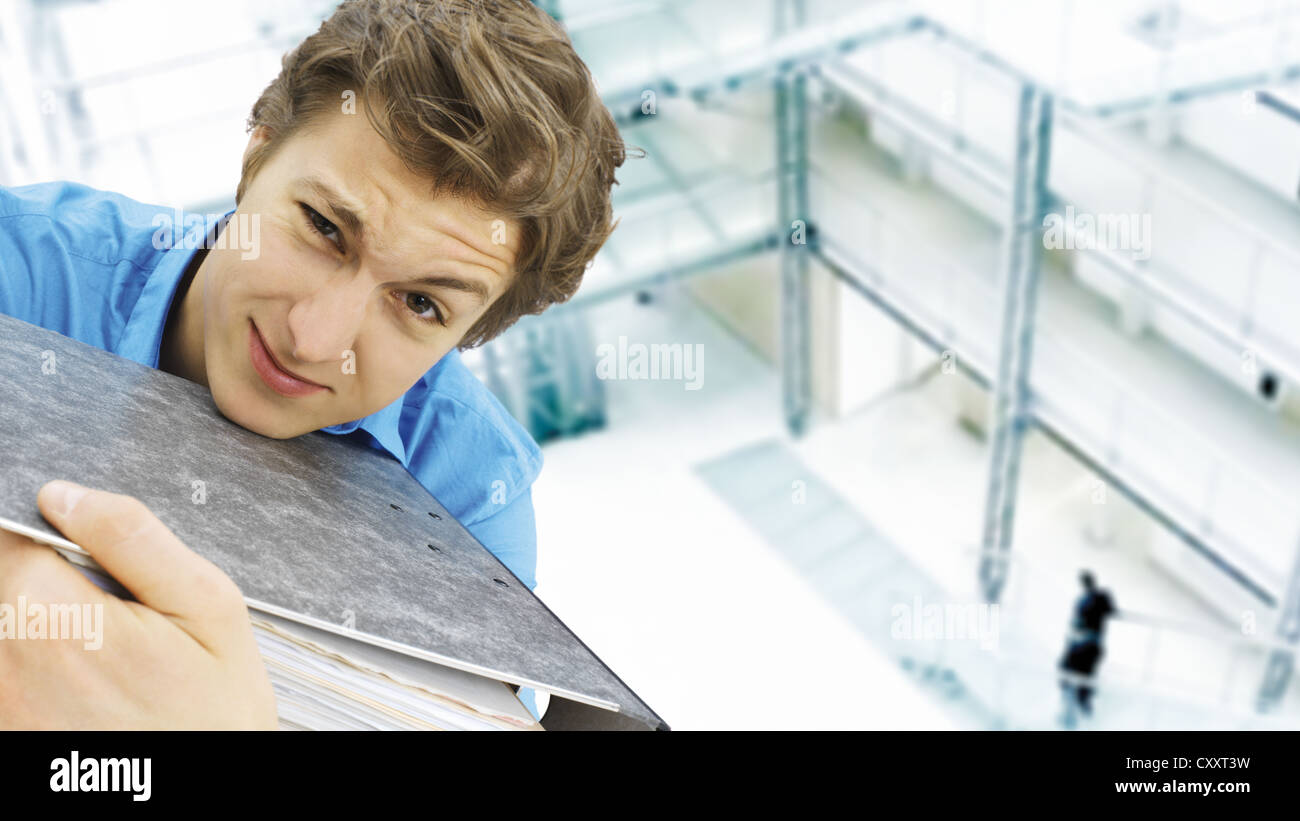 Business man carrying papers hi-res stock photography and images - Alamy