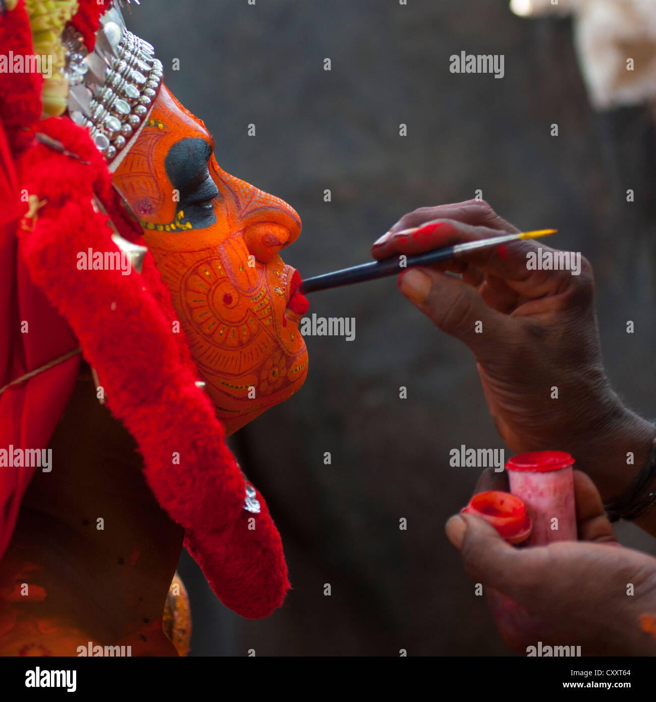 Theyyam Artist Having Make Up Applied On His Face, Thalassery, India ...